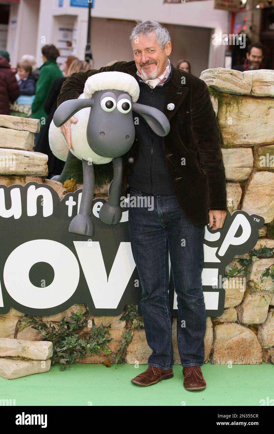 Comedian Griff Rhys Jones poses for photographers on arrival at the ...