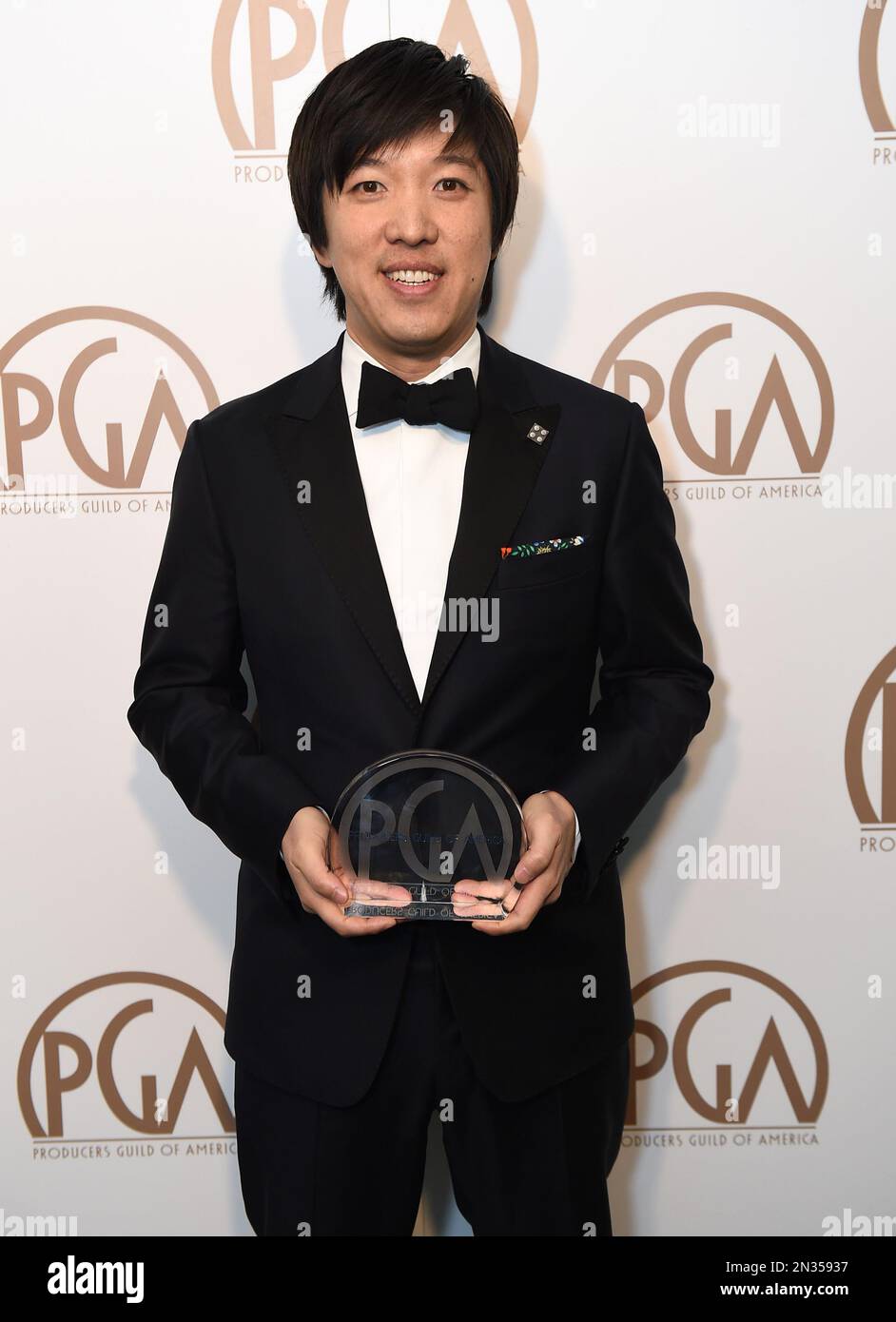 EXCLUSIVE - Dan Lin poses with the award for outstanding producer of animated theatrical motion ...