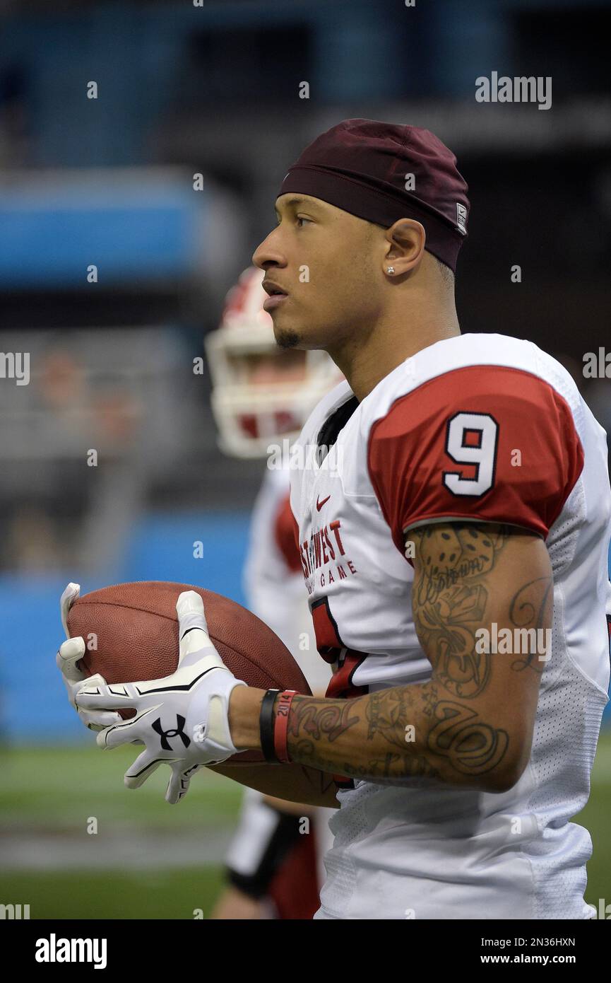 East wide receiver Deon Long (9), of Maryland, watches from the ...
