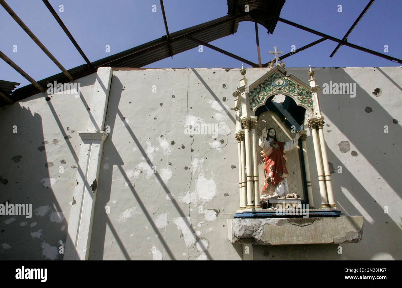 FILE – In this Sept. 16, 2008 file photo, a bullet ridden wall and ...