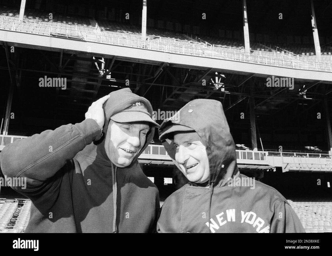Allie Sherman, right, coach of the New York Giants, is shown with his quarterback Y.A. Tittle ...