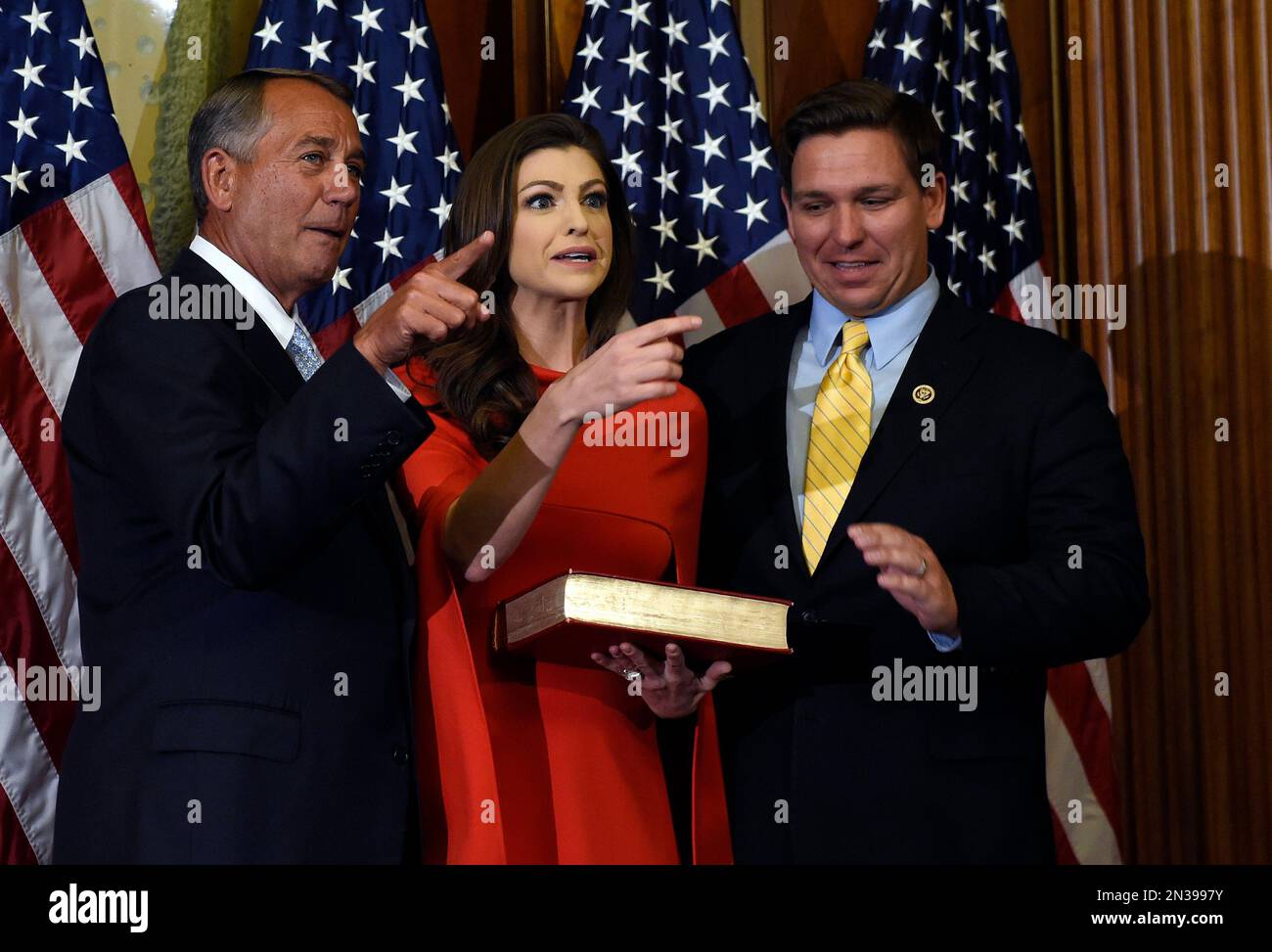 House Speaker John Boehner of Ohio, left, tells Rep. Ron DeSantis, R ...