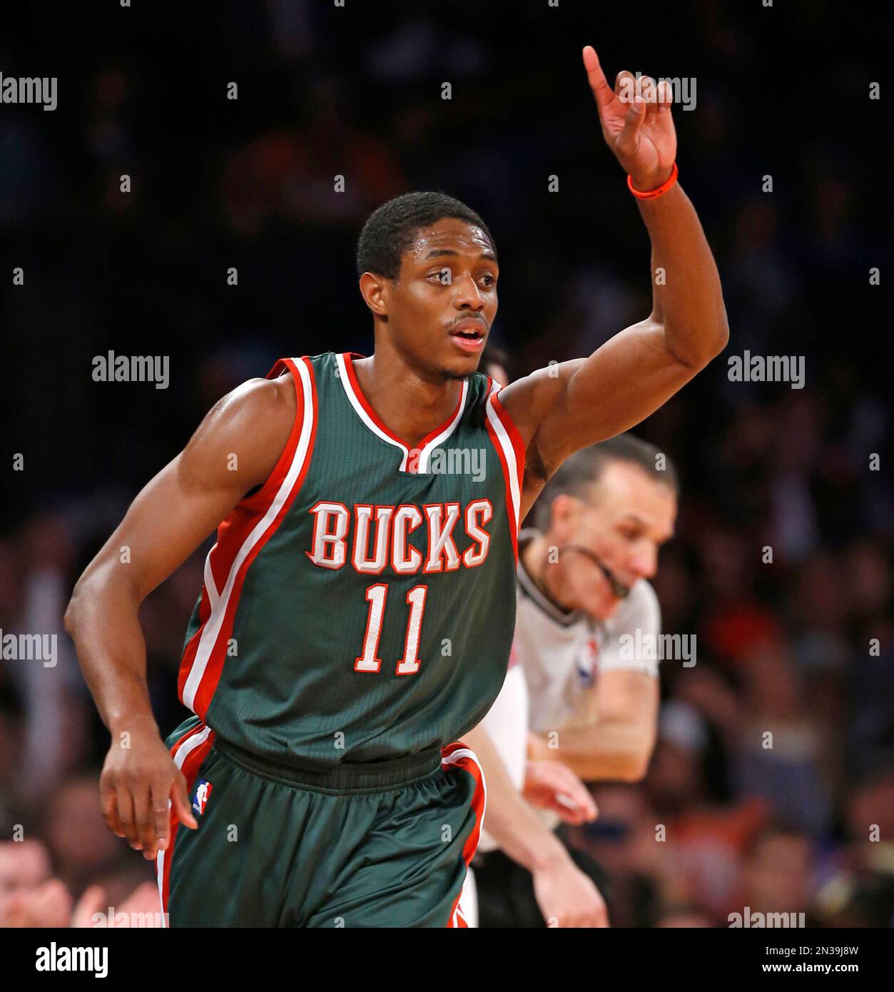 Milwaukee Bucks guard Brandon Knight (11) gestures after hitting a ...