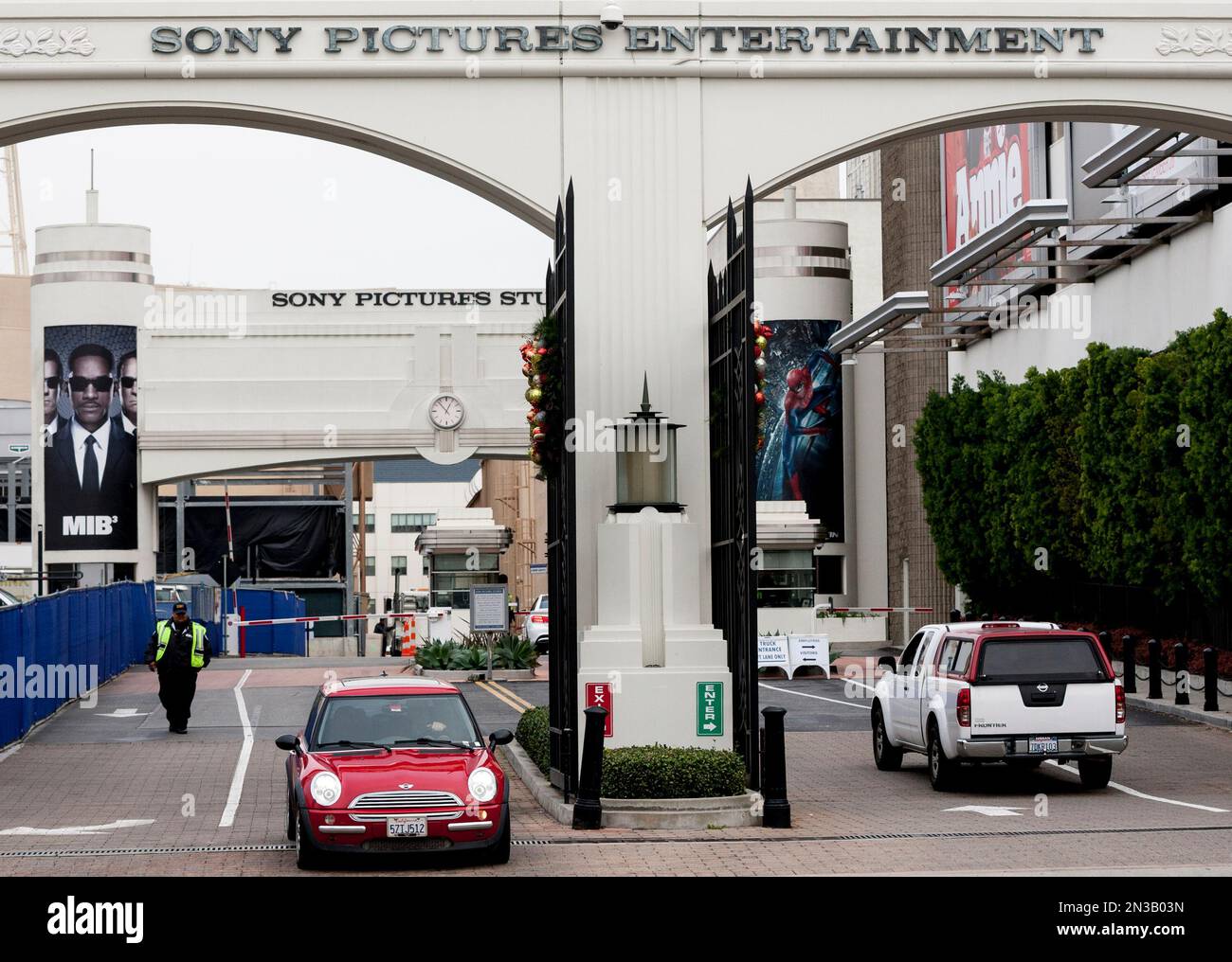 FILE - In this Thursday, Dec. 18, 2014 file photo, cars enter and ...