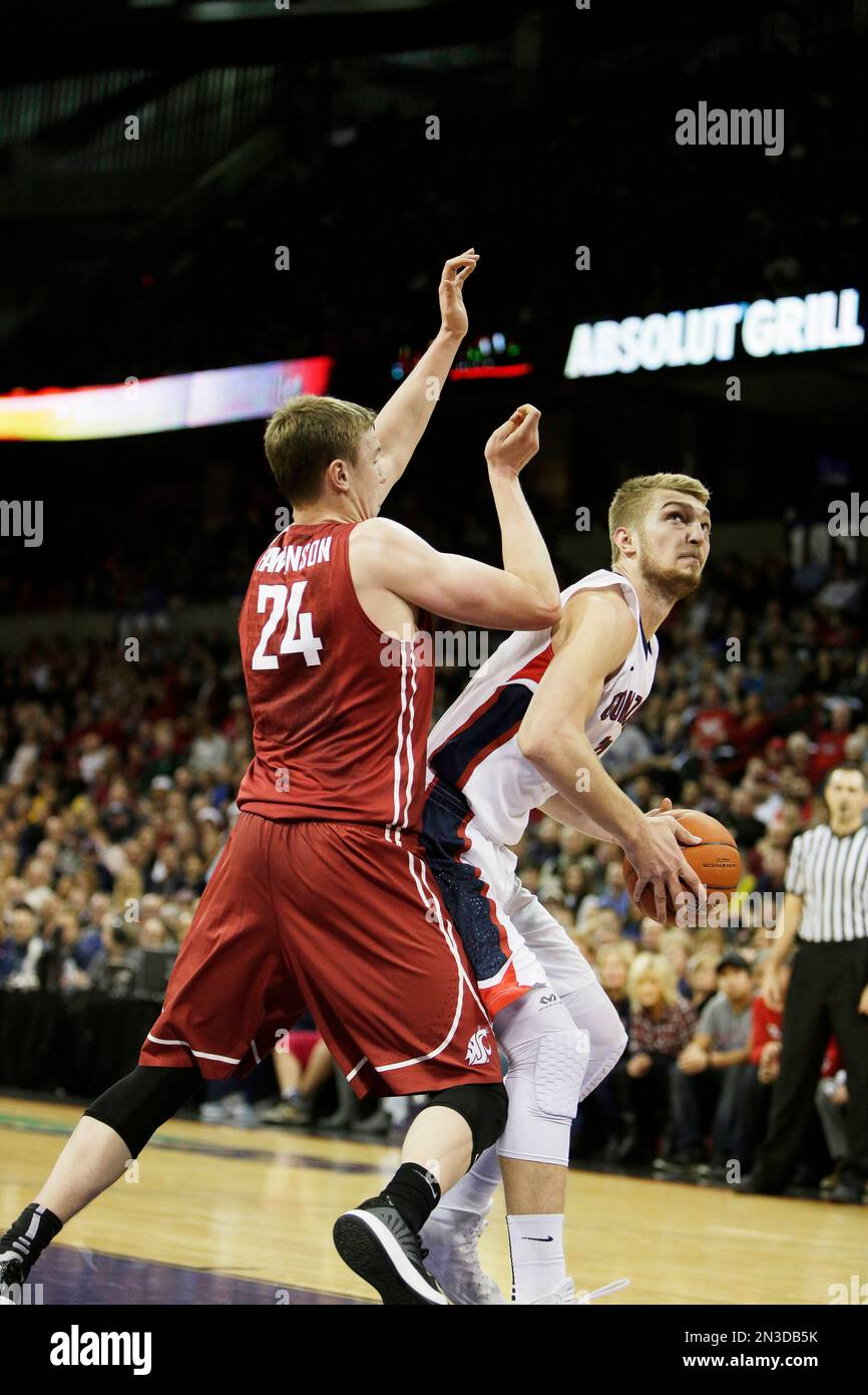 Gonzaga's Domantas Sabonis, right, prepares to take a shot against Washington State's Josh ...