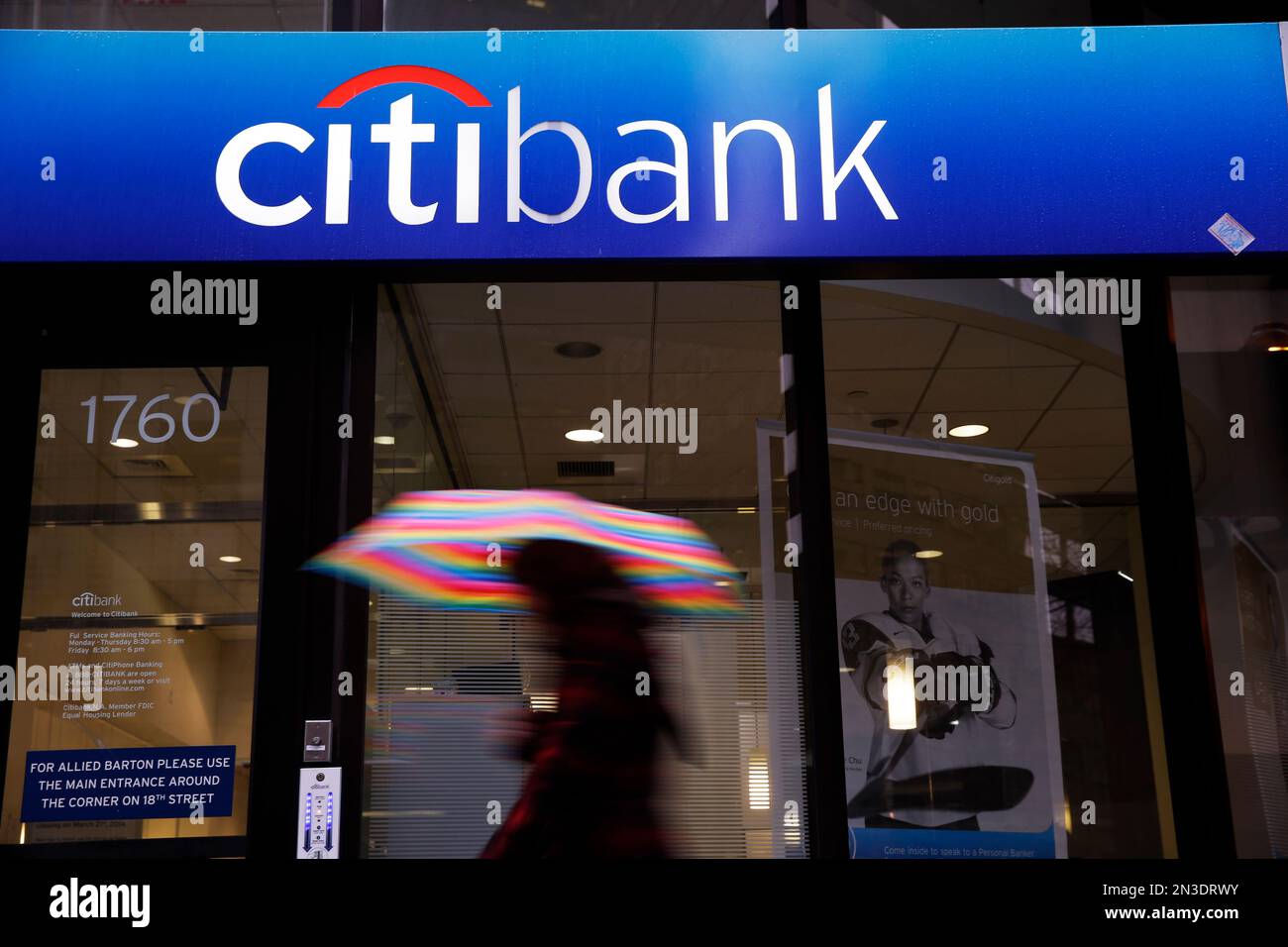 FILE - In this Jan. 14, 2014, file photo, a person walks past a ...