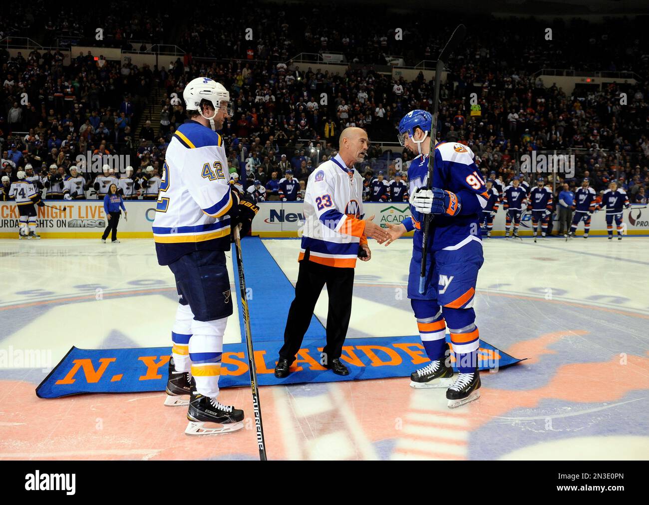 Former New York Islander, Bobby Nystrom shakes hands with New York ...