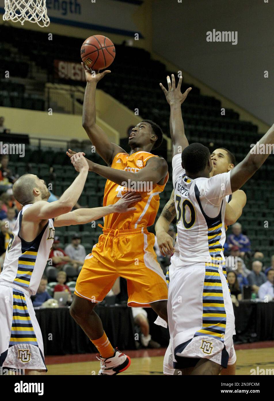 Tennessee forward Armani Moore (4) shoots over Marquette guard Matt ...