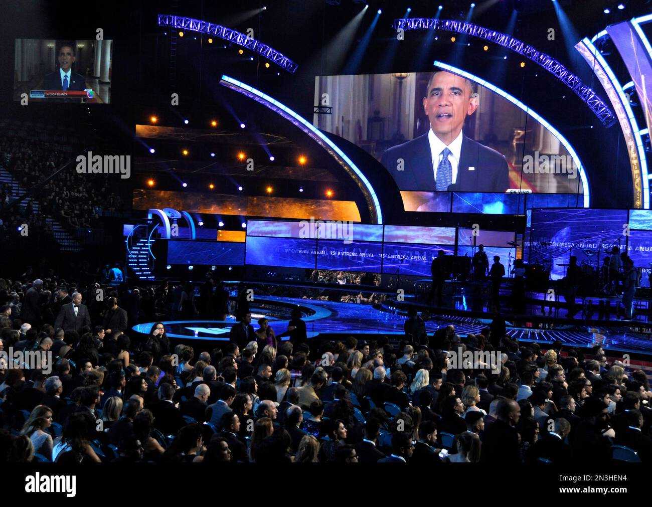 President Barack Obama appears on screen at the 15th annual Latin ...