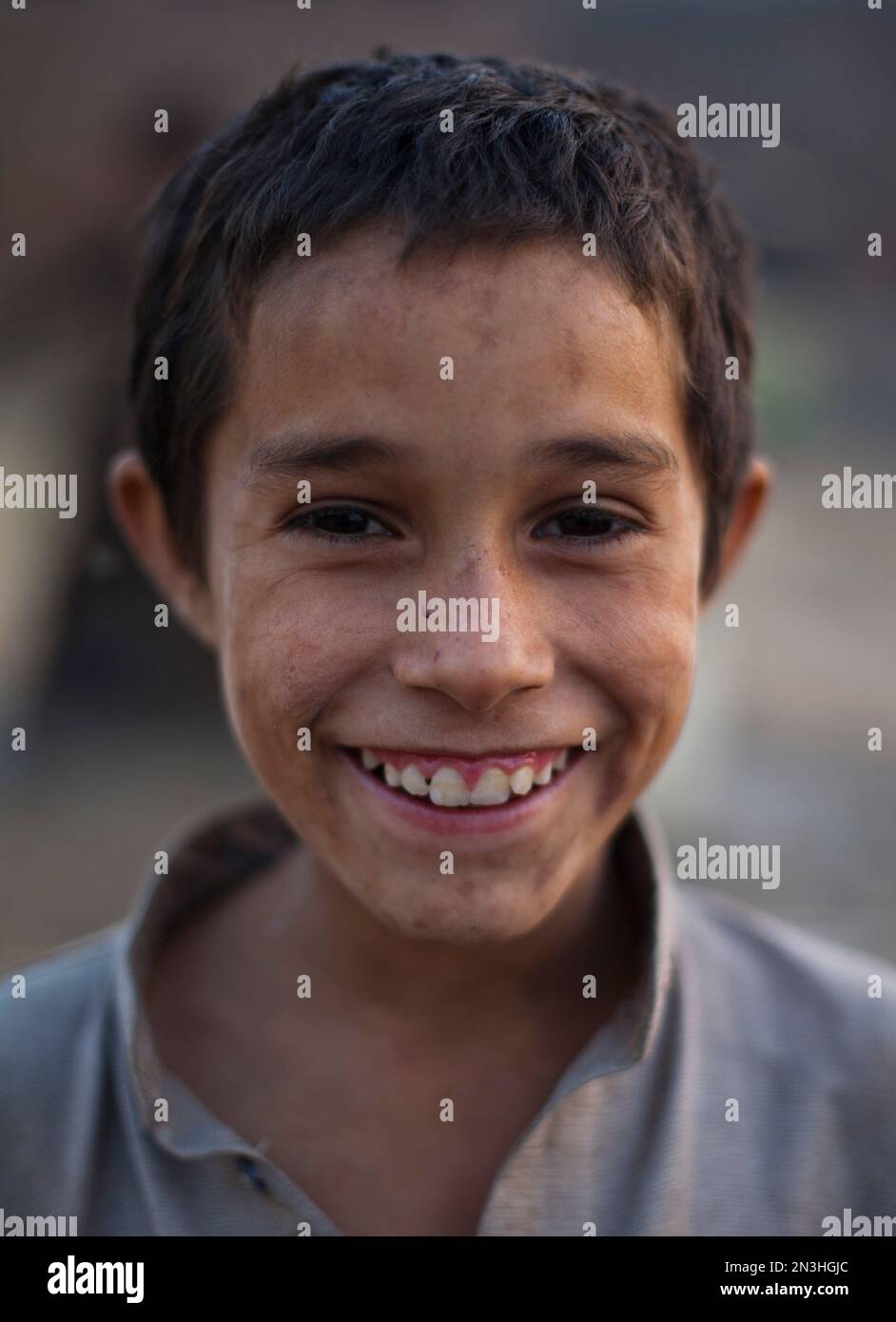 A Pakistani child who is displaced with his family from Pakistani ...