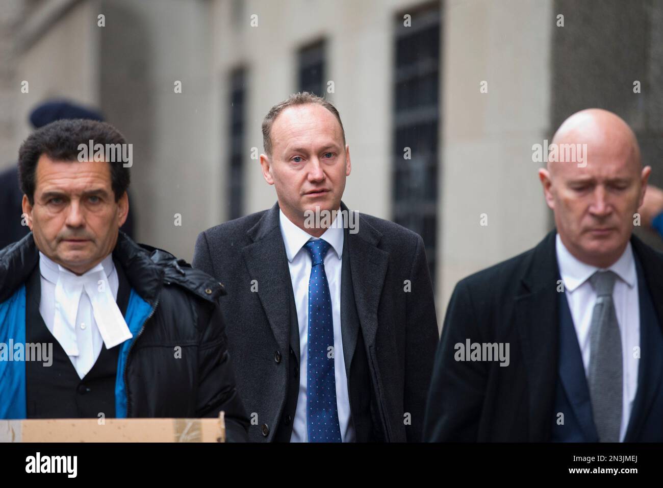 Gary Clarence, center, originally from South Africa, arrives at the Old ...