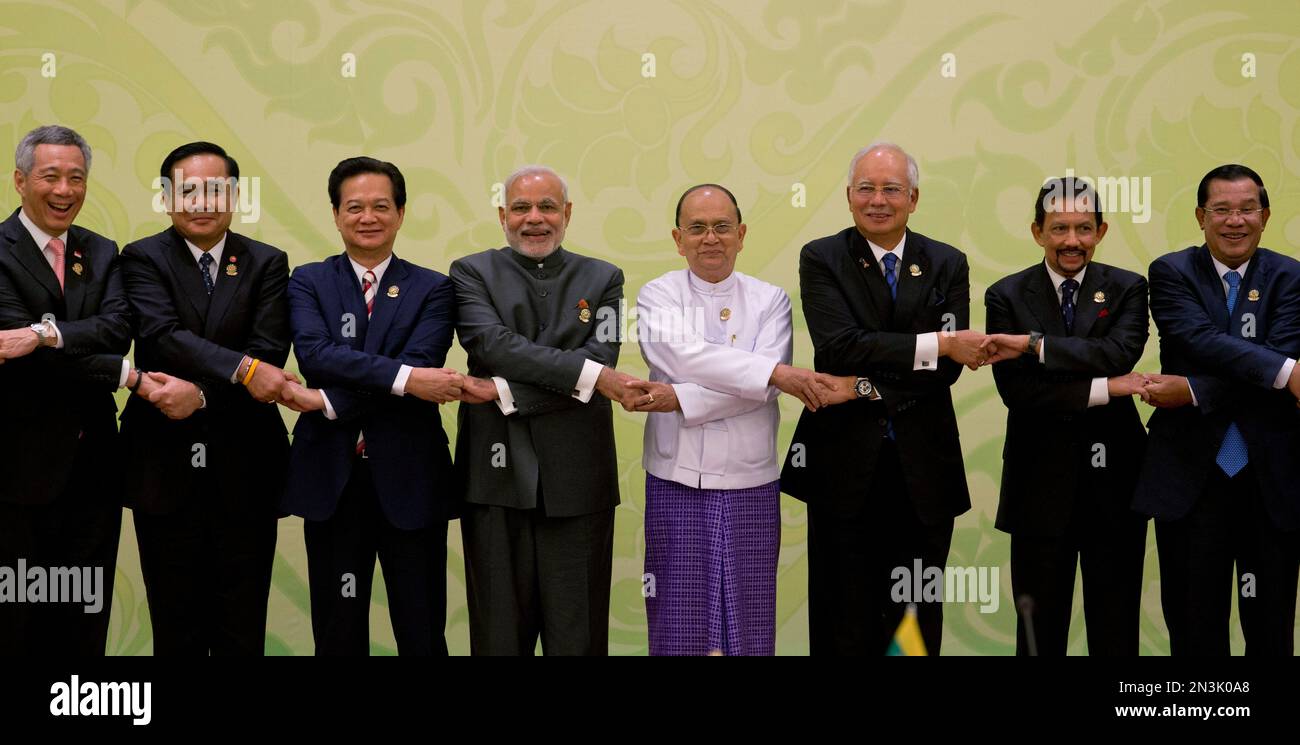 Indian Prime Minister Narendra Modi, fourth from left, poses for a ...