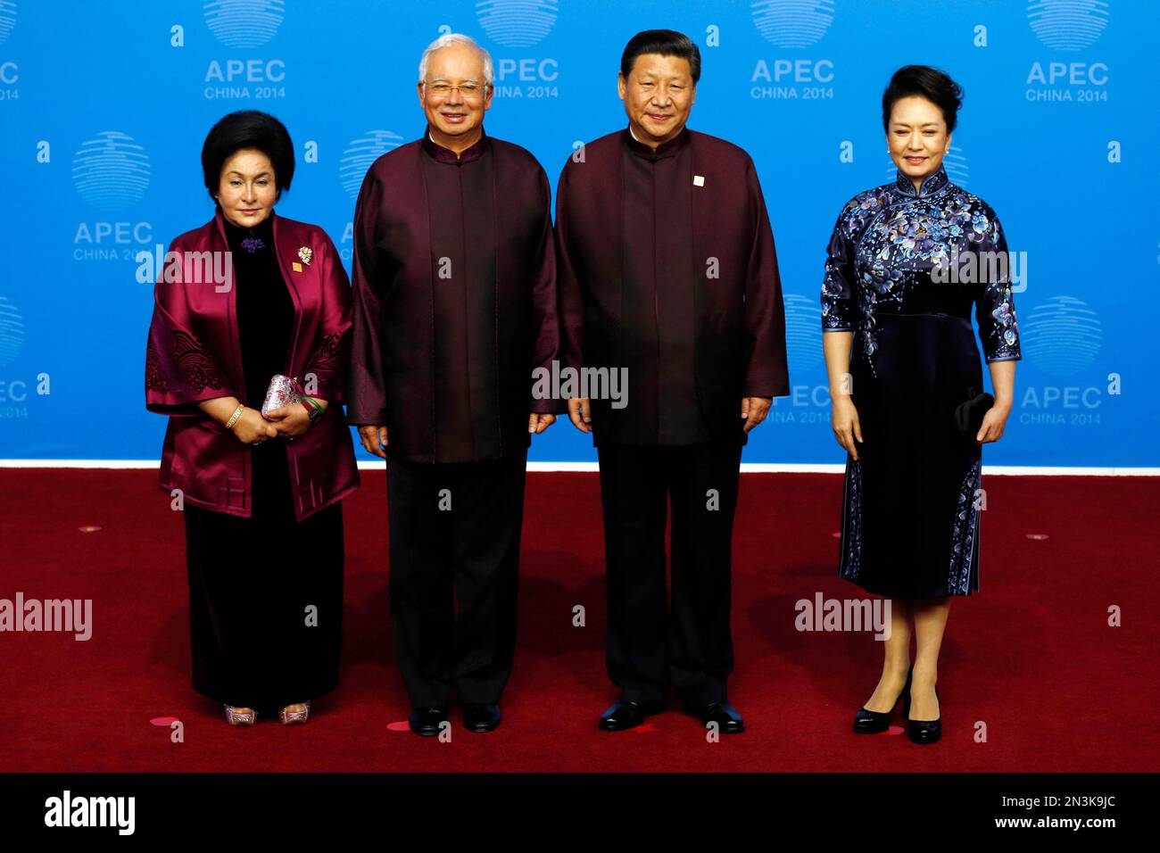 Malaysian Prime Minister Najib Razak, second left, and his wife Datin Seri Rosmah Mansor, left ...