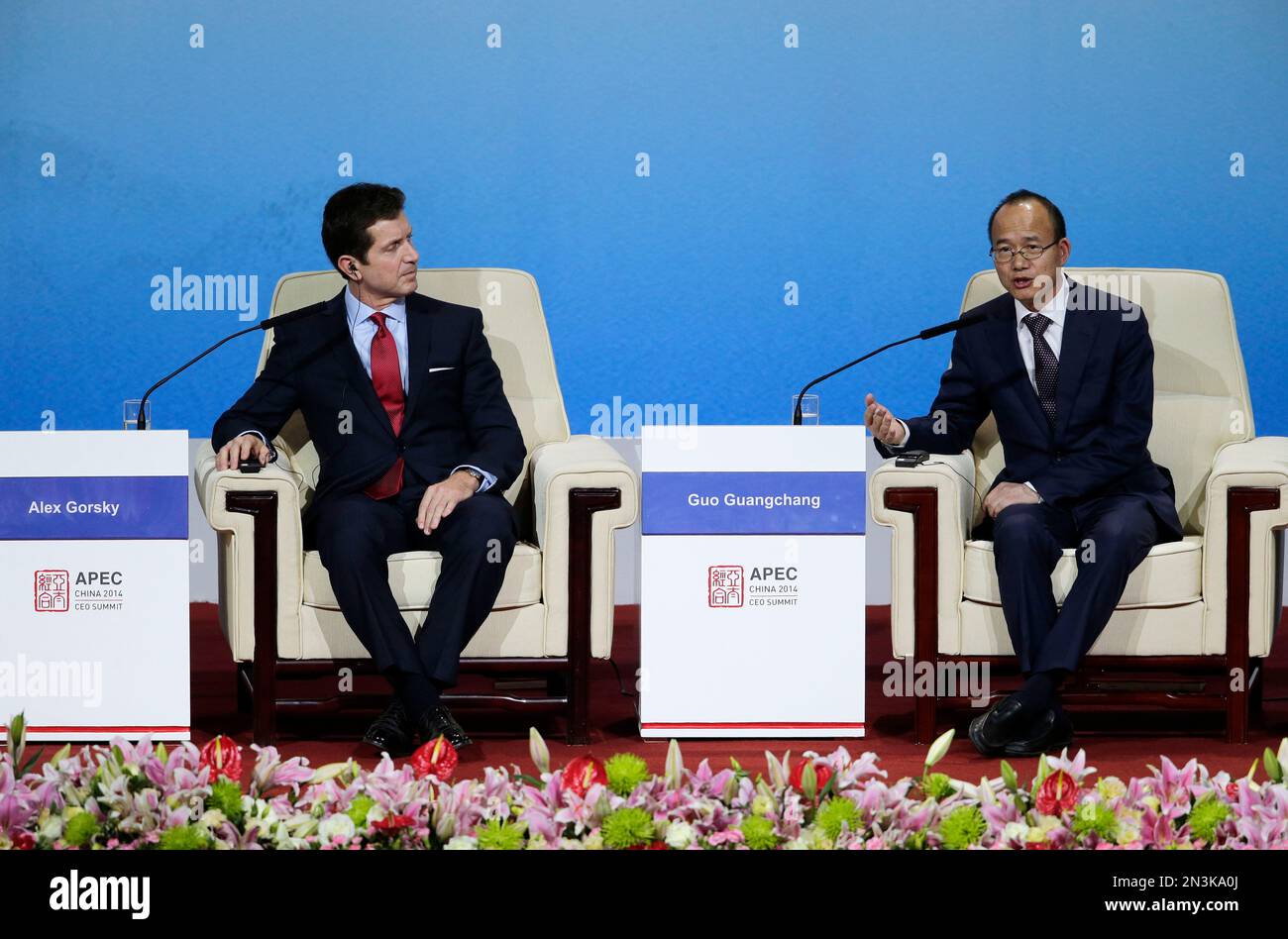 Guo Guangchang, Chairman of Bosun Group, right, speaks next to Alex ...