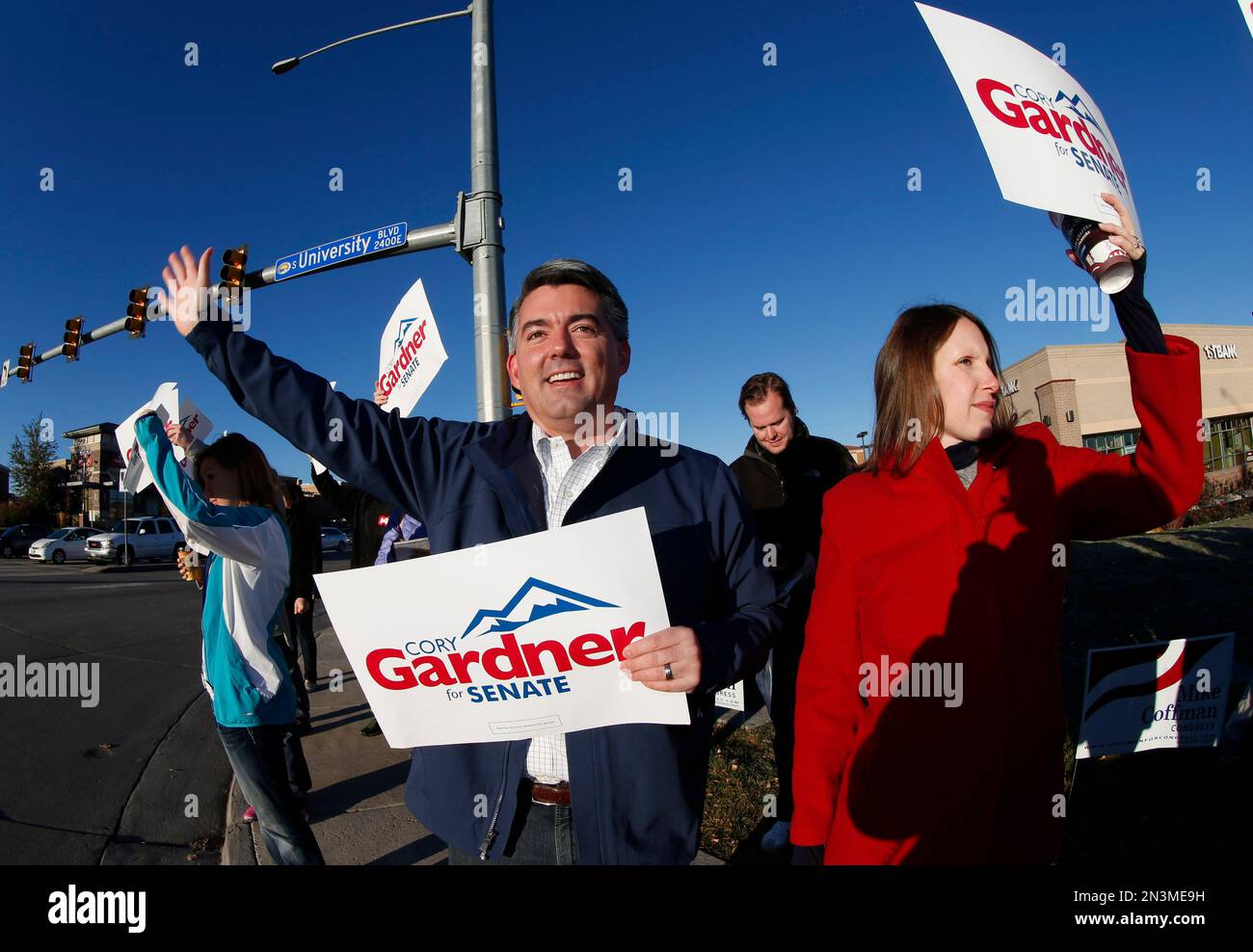 As viewed through fisheye lens, Cory Gardner, left, Republican ...
