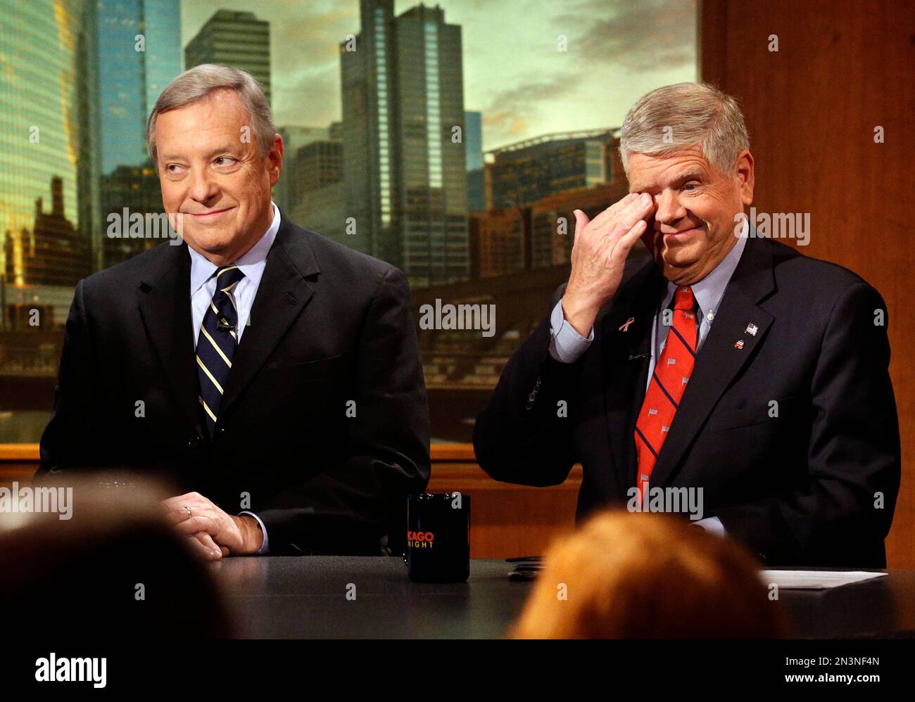 Democratic U.S. Sen. Dick Durbin, left, listens to Phil Ponce as ...