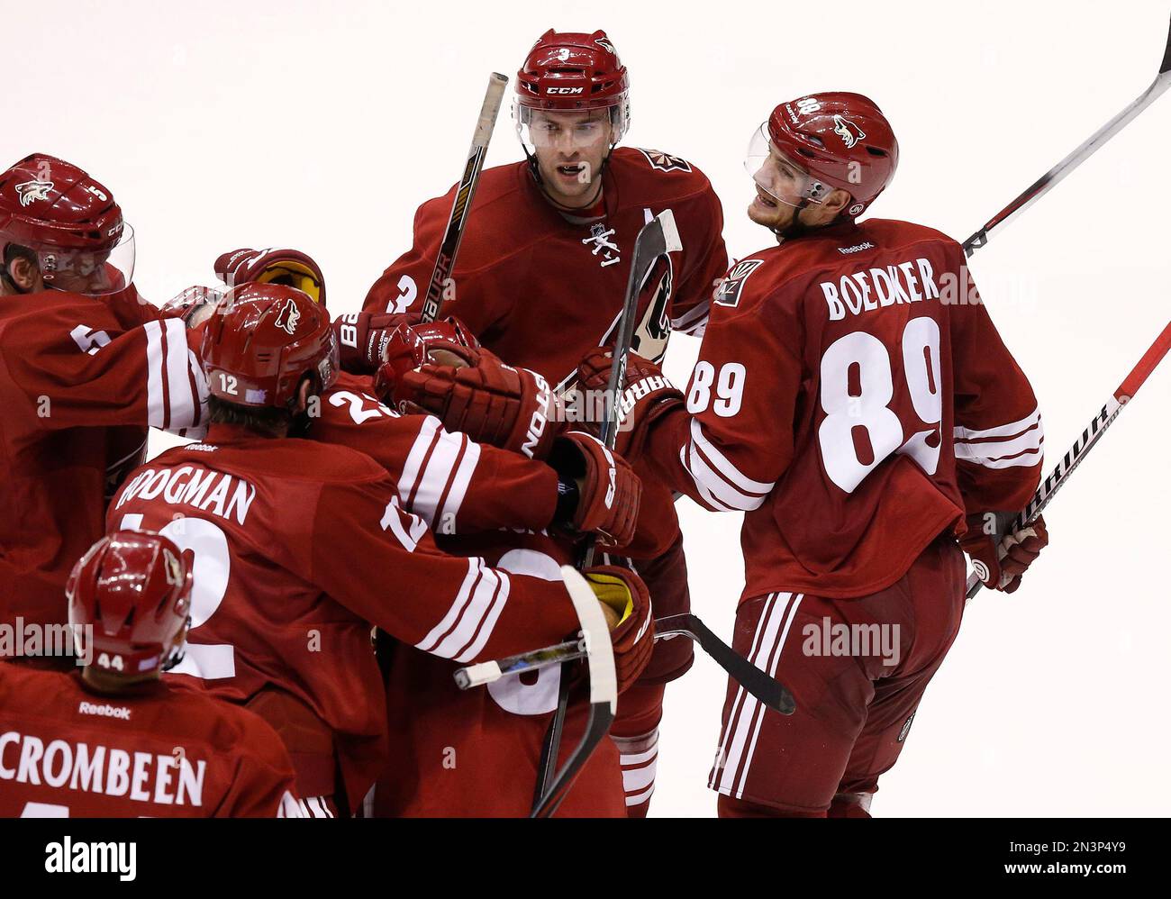 Arizona Coyotes' Oliver Ekman-Larsson (23), of Sweden, is surrounded by ...