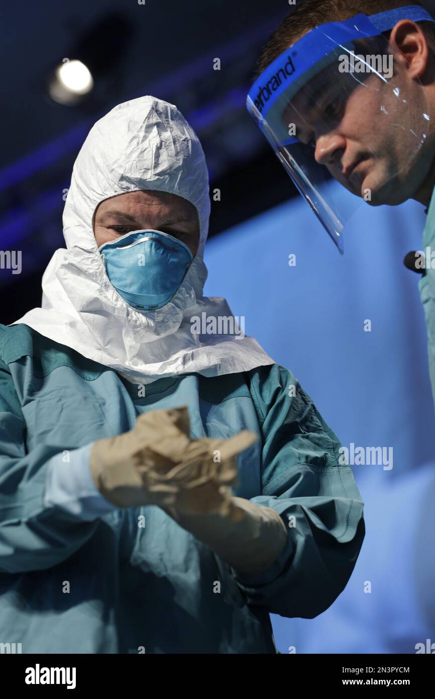 Nurse Barbara Smith, left, and Dr. Bryan Christensen demonstrate the ...