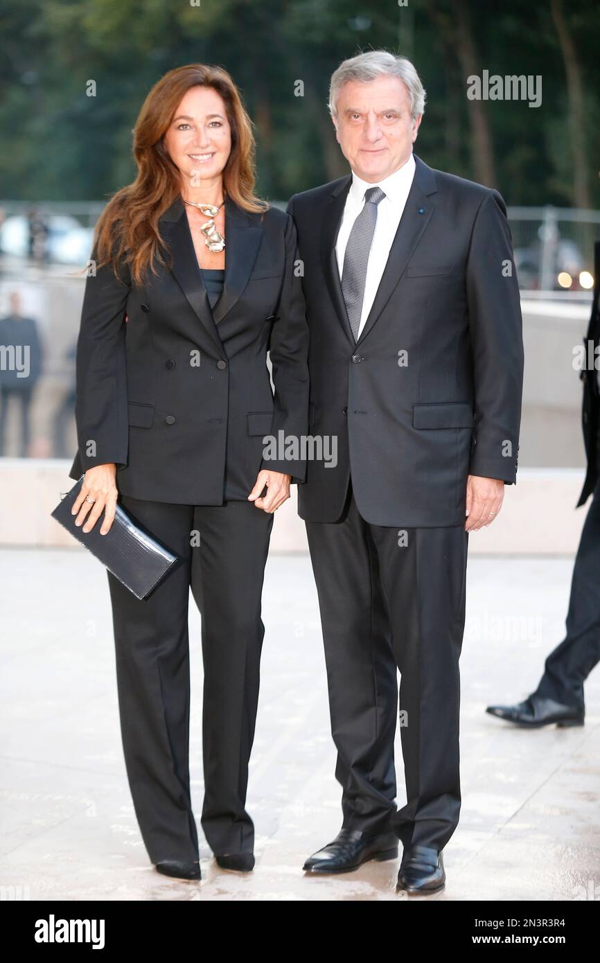Dior fashion house CEO Sidney Toledano and his wife Katia arrive at the ...