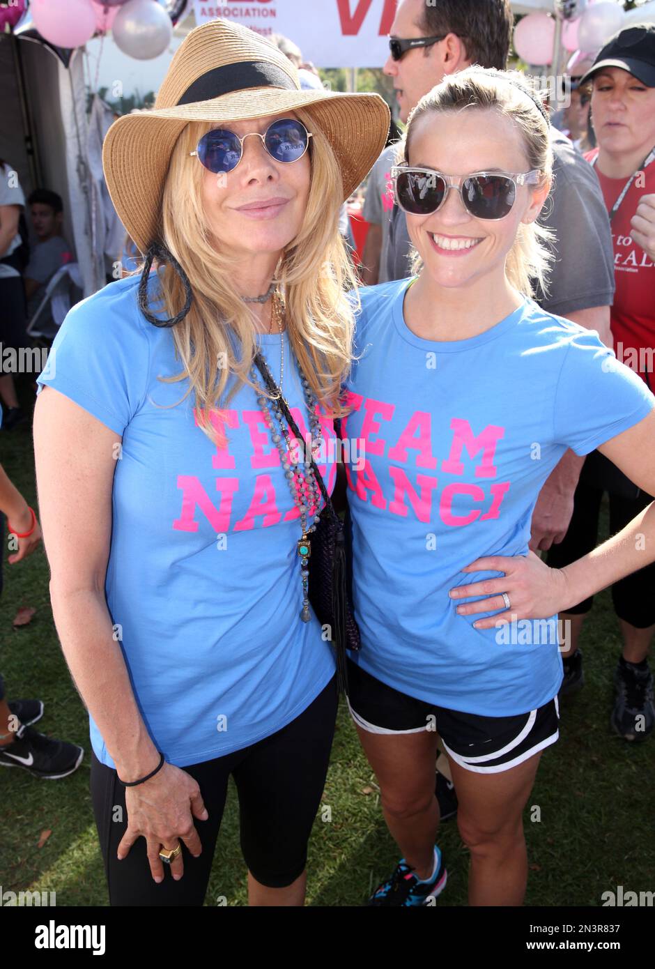 Reese Witherspoon, right, and Rosanna Arquette pose for a photo at the ...