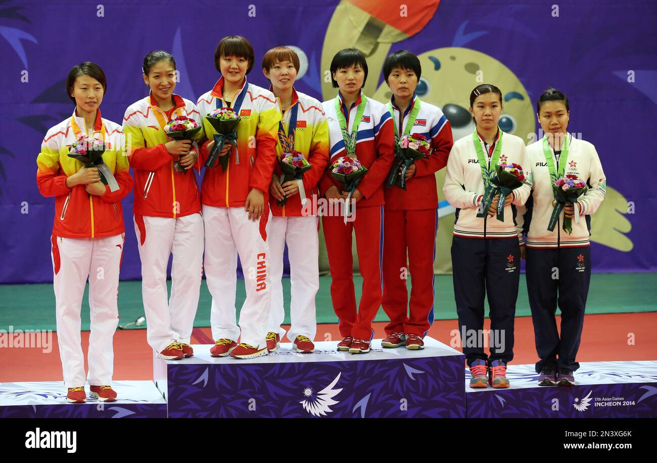 From left, silver medallists China's Wu Yang and Liu Shiwen, gold ...