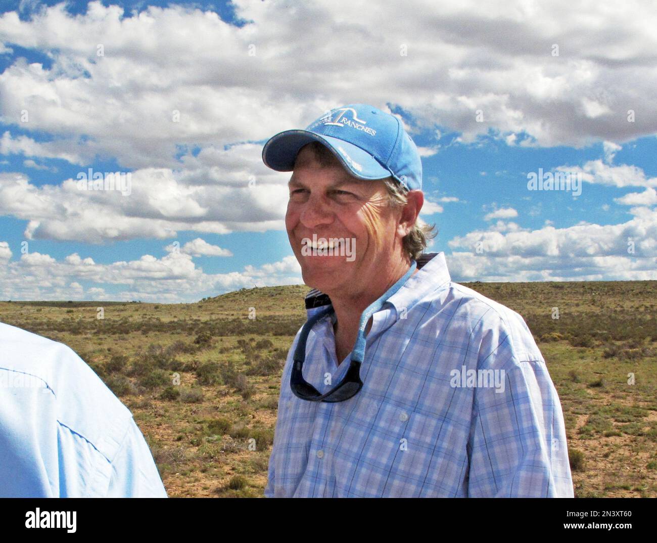 Bill Cordasco, right, president of Babbitt Ranches, speaks about the release of black-footed ...