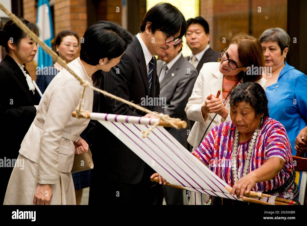 Japan's Prince Akishino, center, and his wife Princess Kiko, left ...
