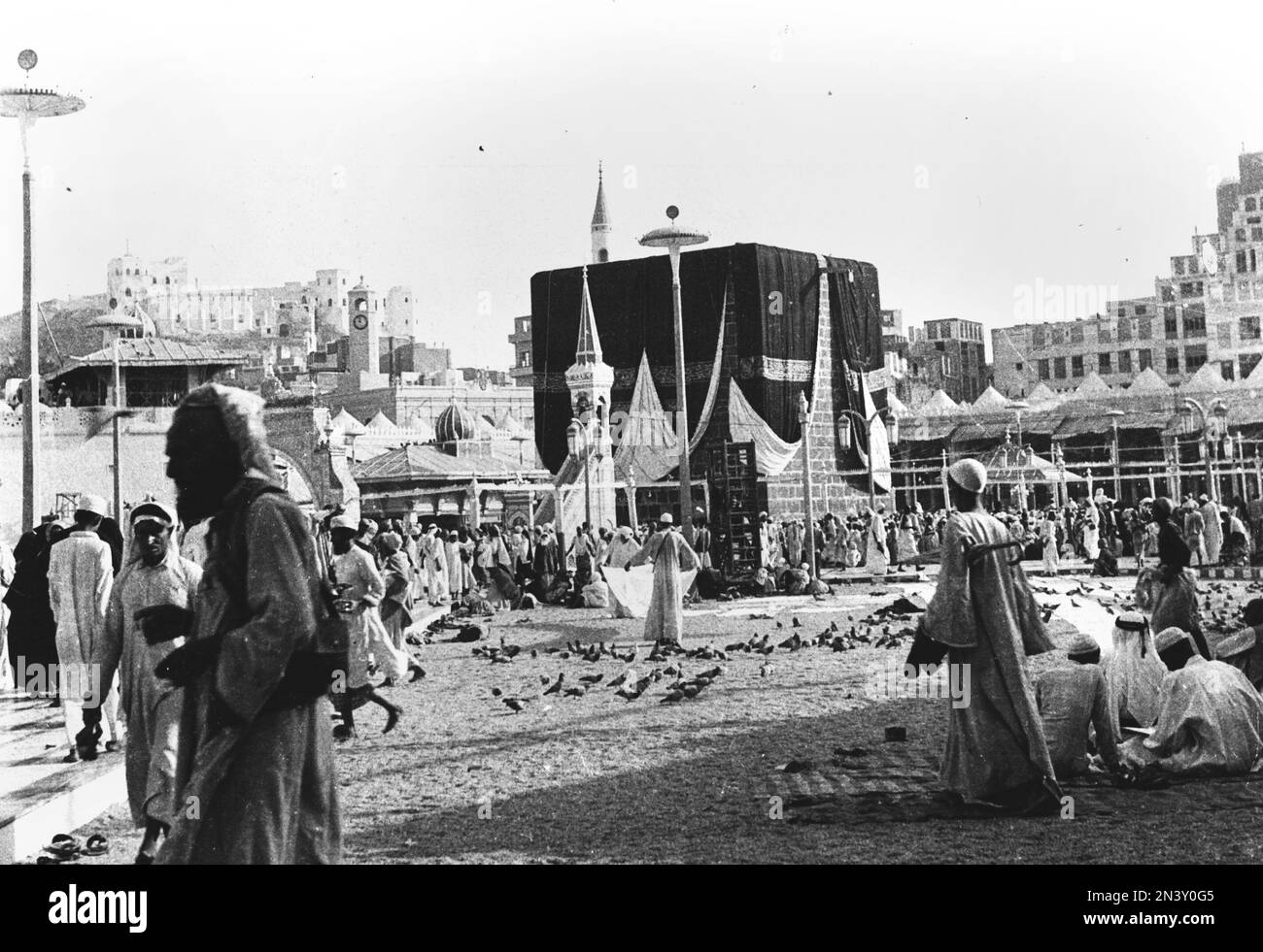 FILE - In this Sept. 7, 1954 file photo, Muslims visit the Kaaba, the ...