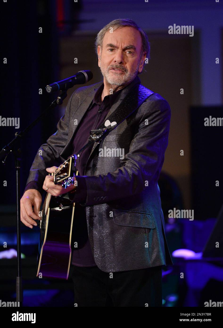 Singer-songwriter Neil Diamond performs at his former high school ...