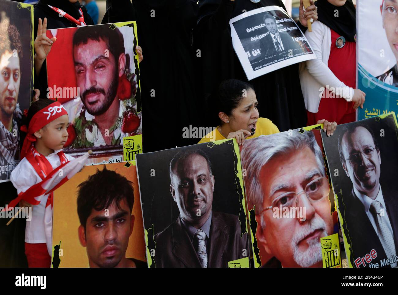 Rula al-Saffar, center in yellow, a Bahraini nurse-turned anti ...