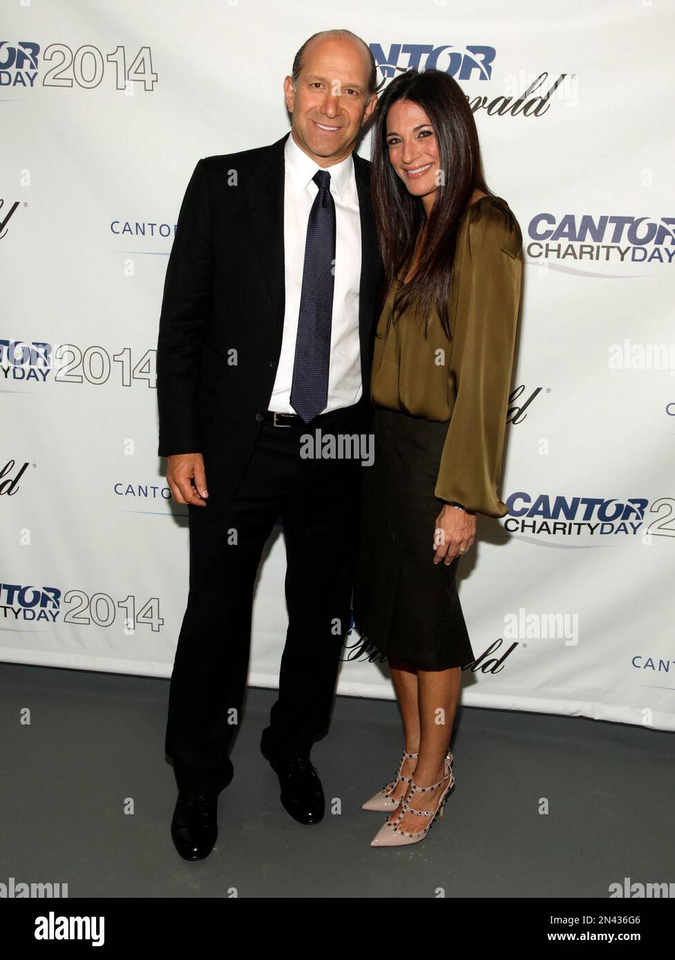 Howard Lutnick, Chairman and CEO of Cantor Fitzgerald, left, and ...