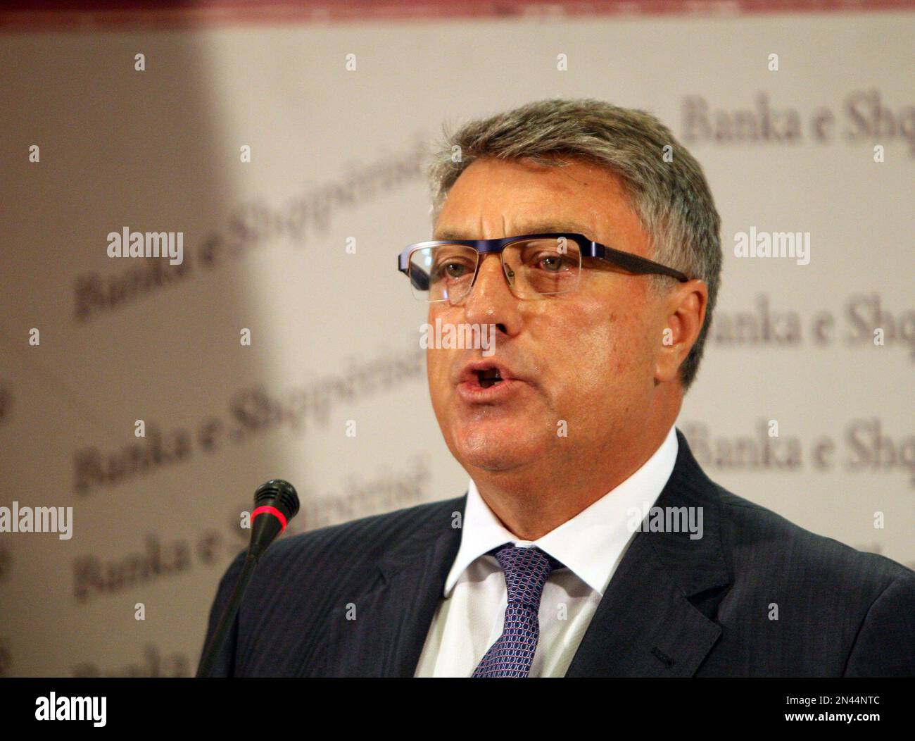 In this photo taken Aug. 27, 2014 central Bank of Albania governor ...