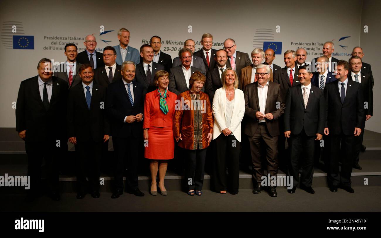 Foreign Ministers pose for a family picture during an informal meeting ...