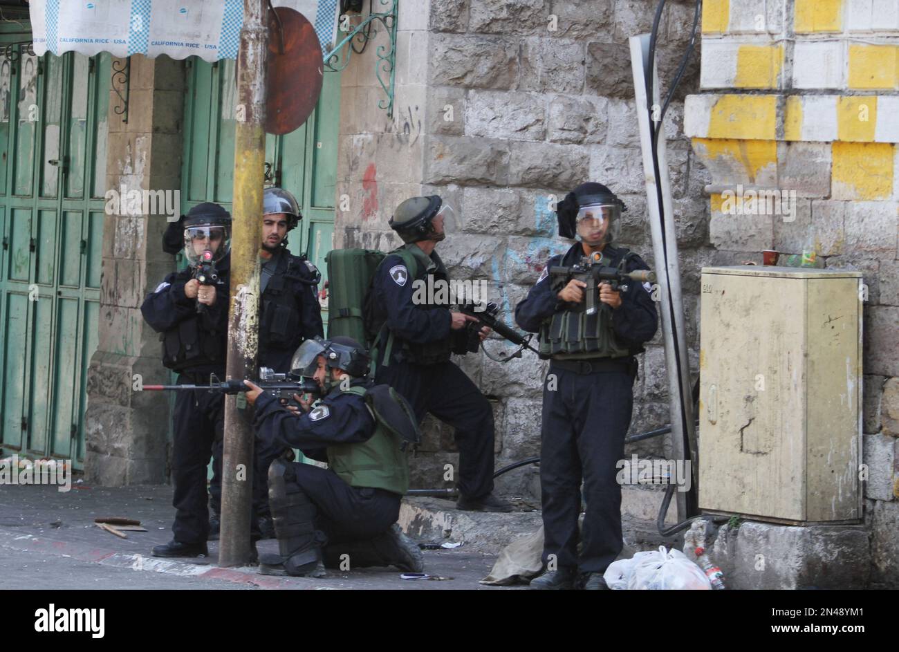 Israeli Soldiers Aim Hold Their Weapons During Clashes With