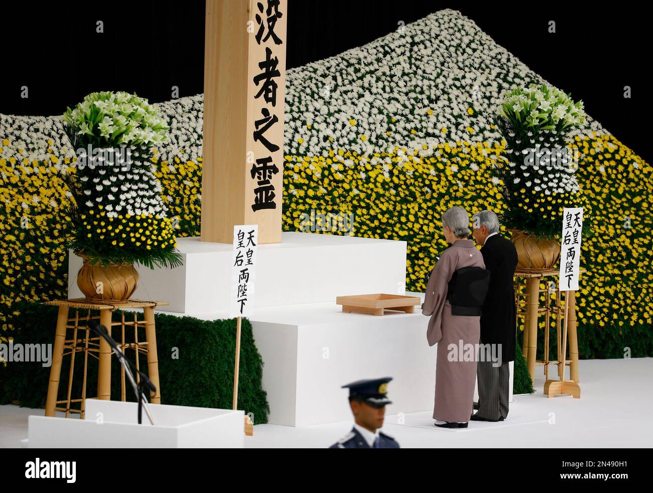 Japan's Emperor Akihito, right, delivers his remarks with Empress ...