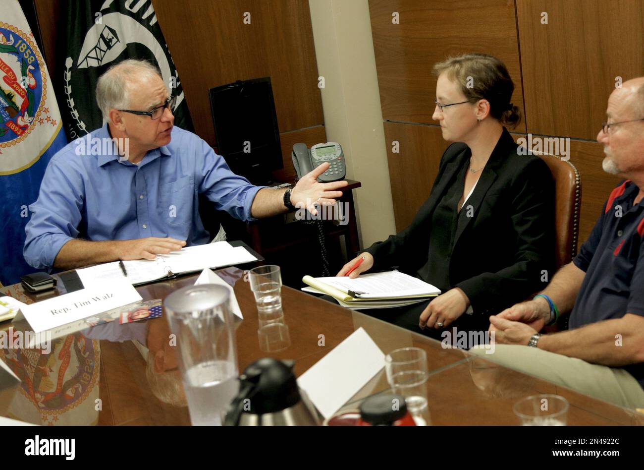 Congressman Tim Walz, D-Minn., left, talks with Melissa Houghtaling ...