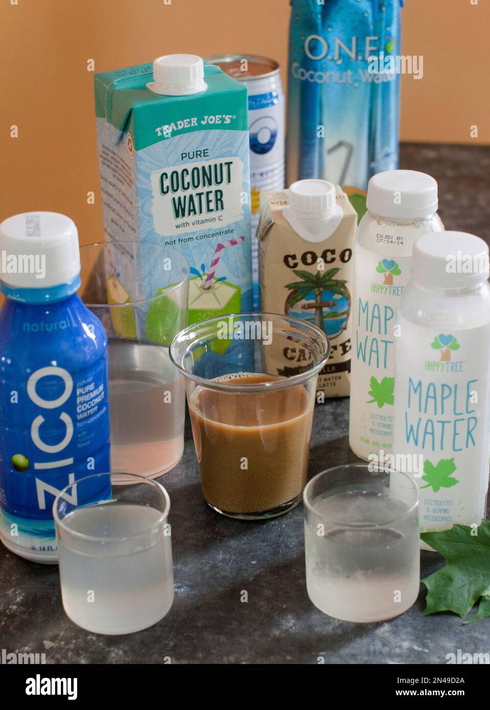 This June 9, 2014 photo shows an assortment of trending waters from ...