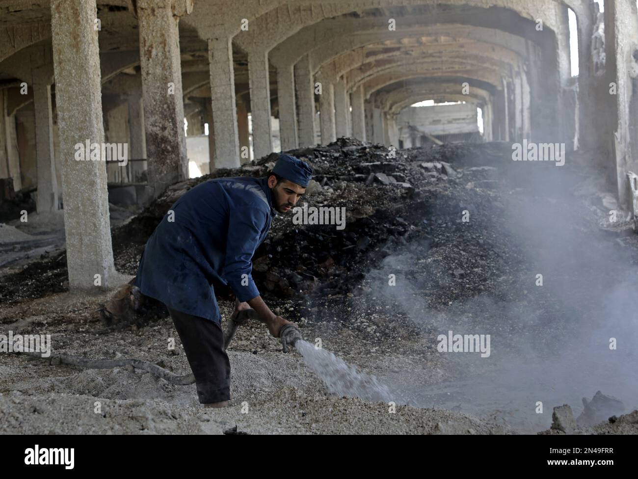 In this Sunday, Aug. 10, 2014 photo, Ahmad Baraka, 25, a Palestinian ...