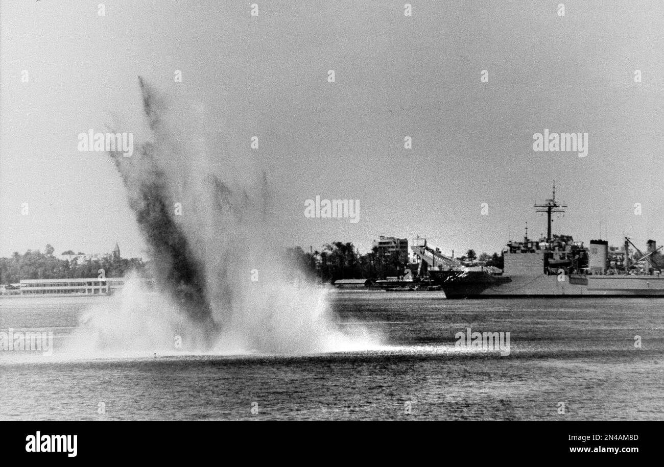 The British Royal Navy blows up a mine off Ismailia during clearing ...