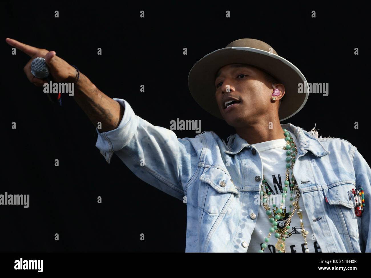 Pharrell Williams performs on the main stage at Wireless festival in ...