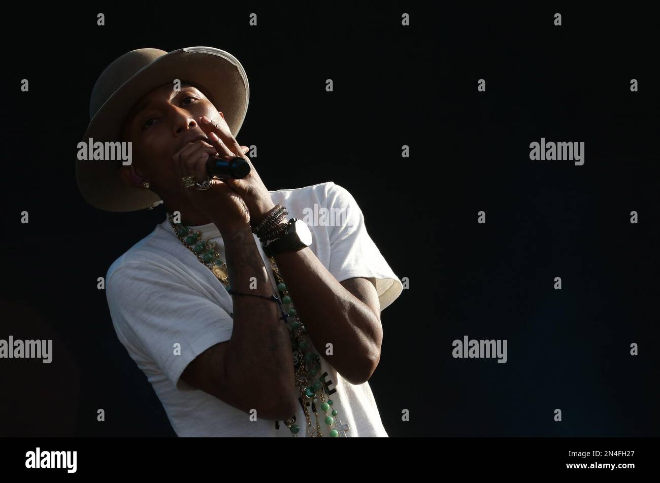 Pharrell Williams performs on the main stage at Wireless festival in ...