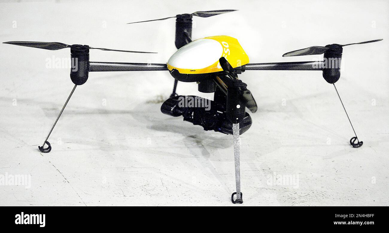 This Tuesday, June 24, 2014 photo shows the Draganflyer X4-ES drone, a ...