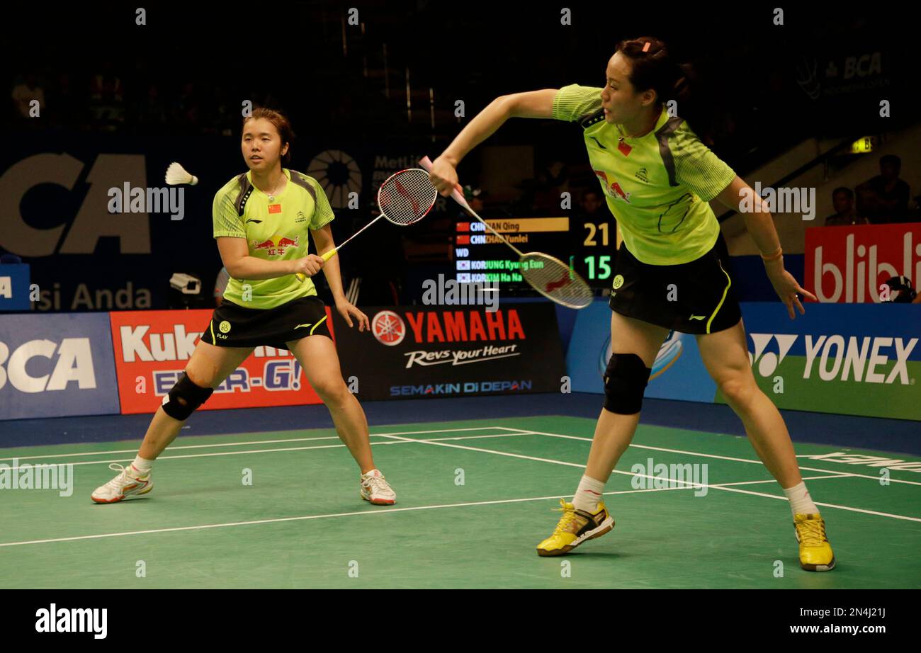 China's Zhao Yunlei, right, returns the shuttlecock to South Korea's ...