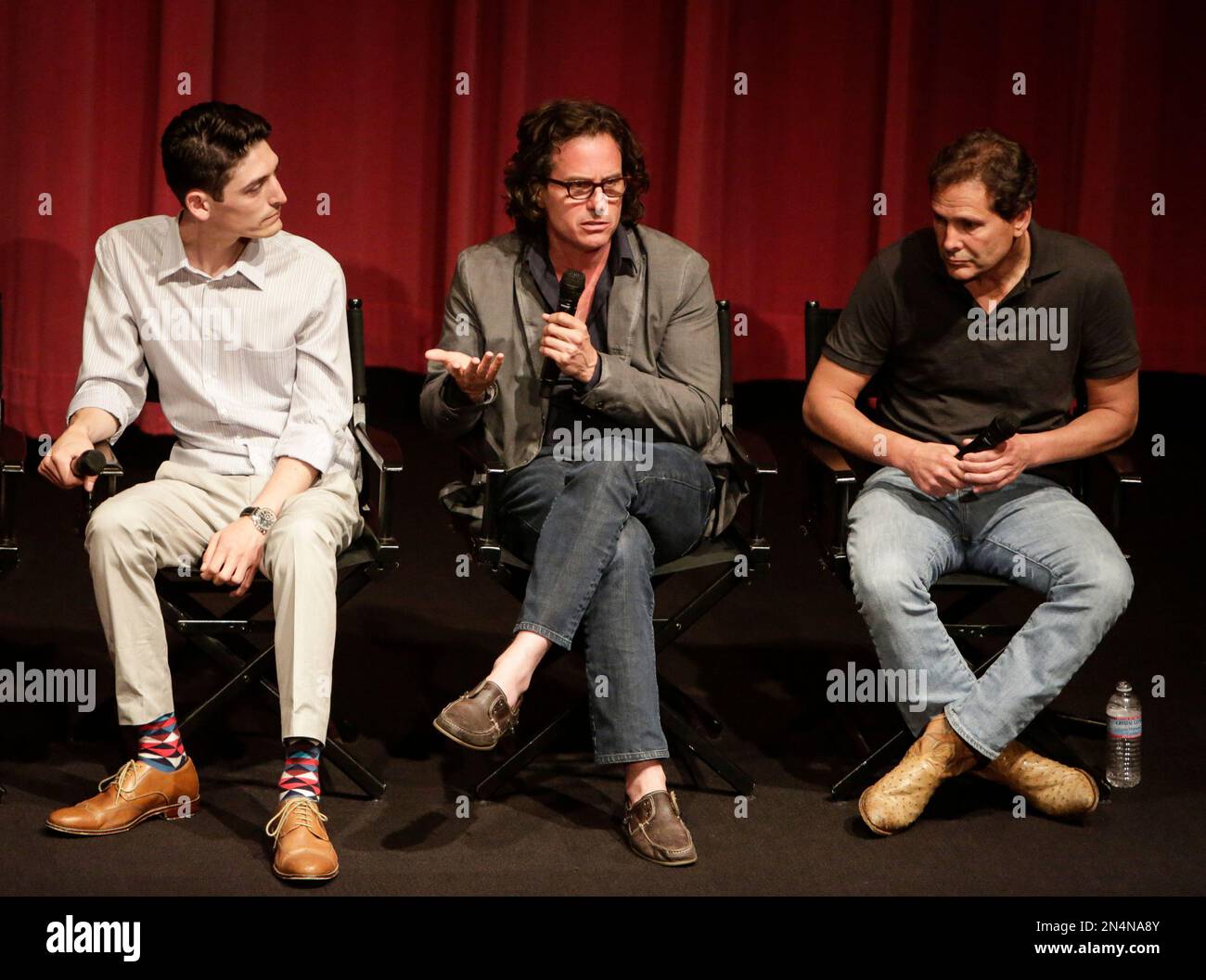 Film producer Davis Guggenheim, middle and film director, Derek Doneen ...