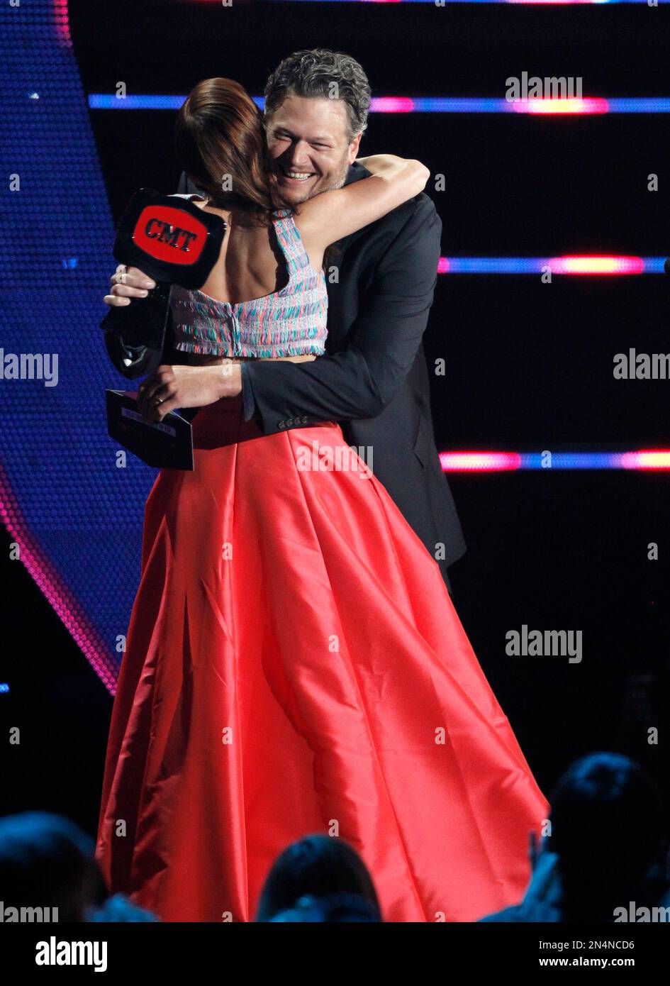 Blake Shelton, right, congratulates Cassadee Pope after presenting her ...