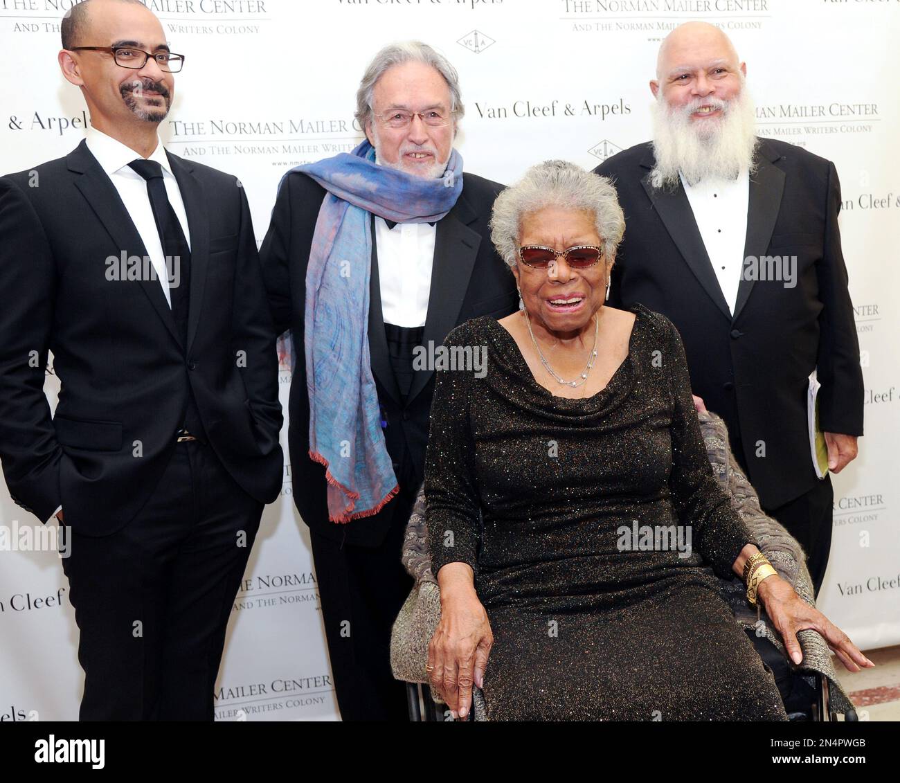 FILE - In this Oct. 17, 2013 file photo, Maya Angelou, seated, Junot ...