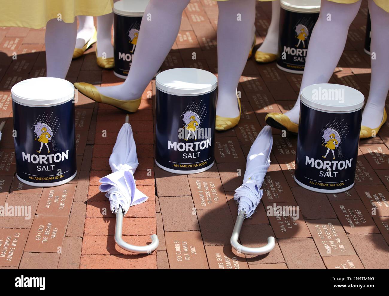 Morton Salt Girls strike the iconic pose as they celebrate the shared ...