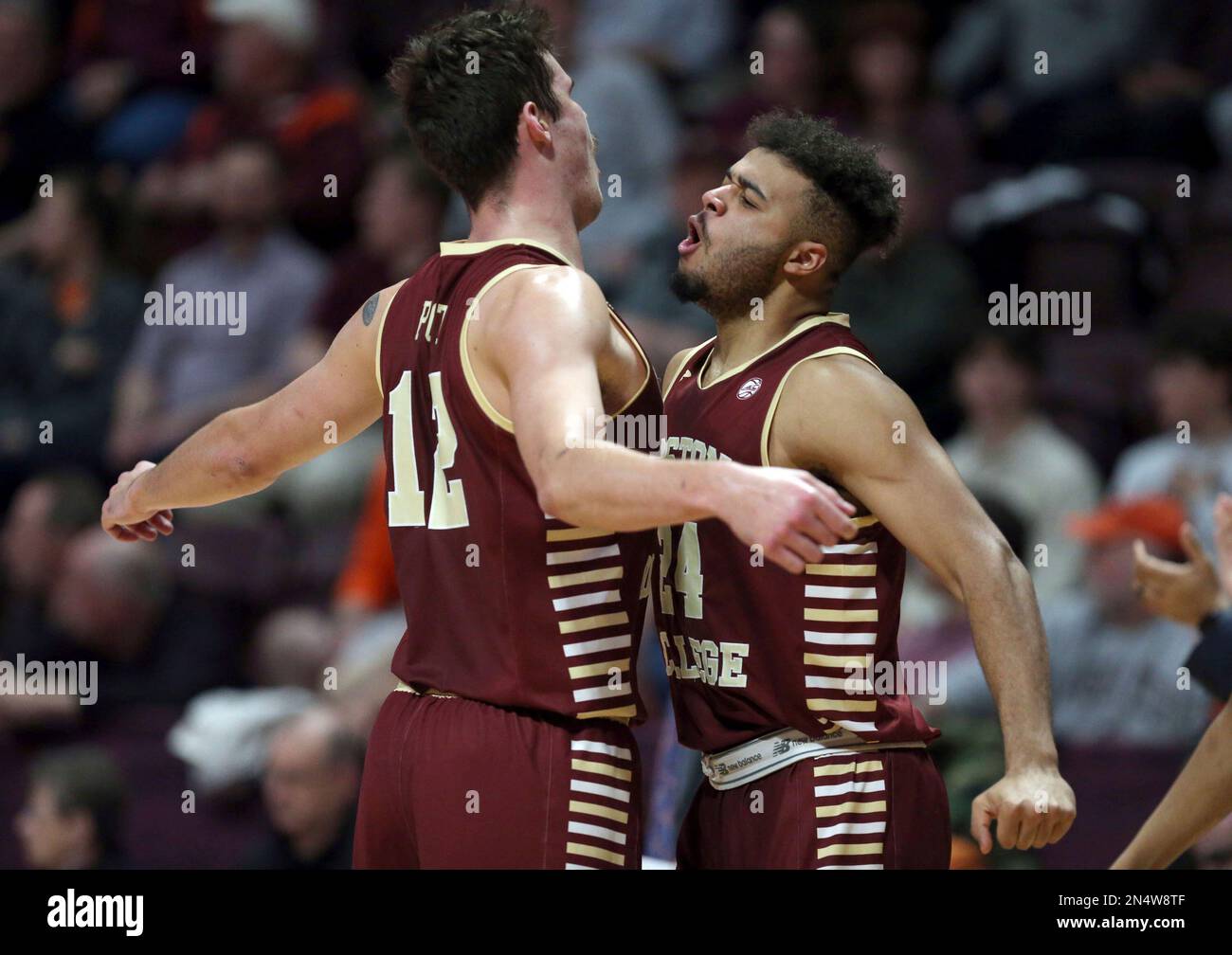 Boston College's Quinten Post, left, and CJ Penha Jr. celebrate a score ...