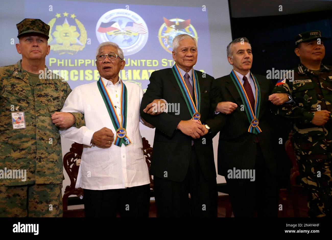 From left, U.S. Marine Col. John A. Rutherford, Philippines Defense ...