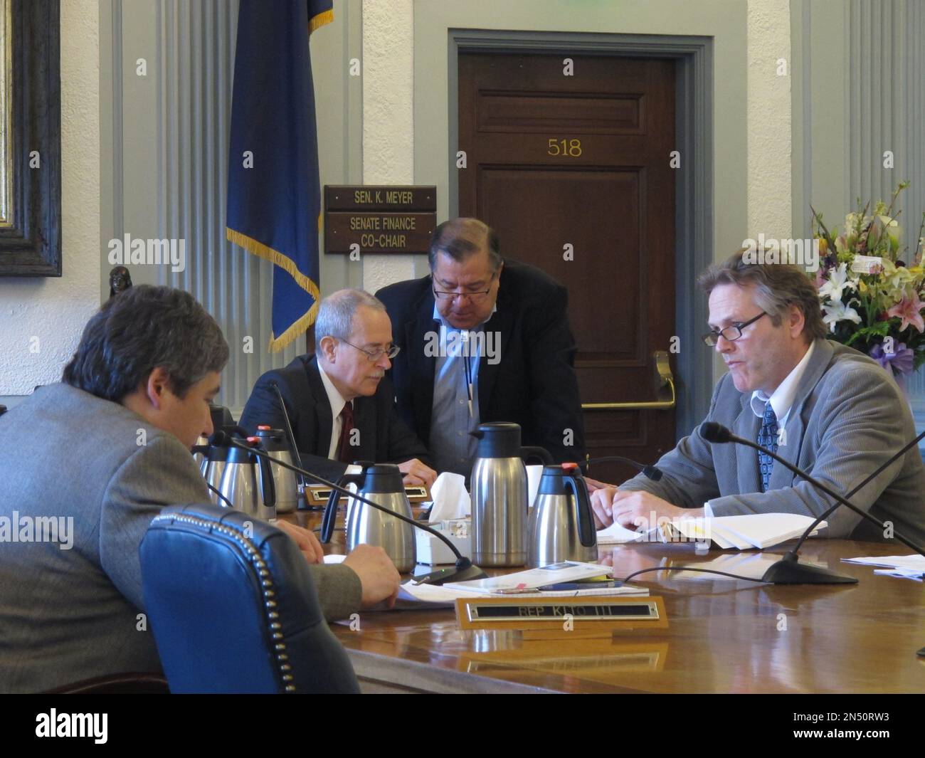 Rep. Mike Hawker and Sen. Lyman Hoffman, who are pictured in the center ...